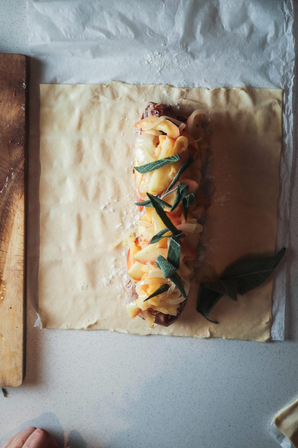 Fancy Pork tenderloin in puff pastry with caramelized apples and onions ...